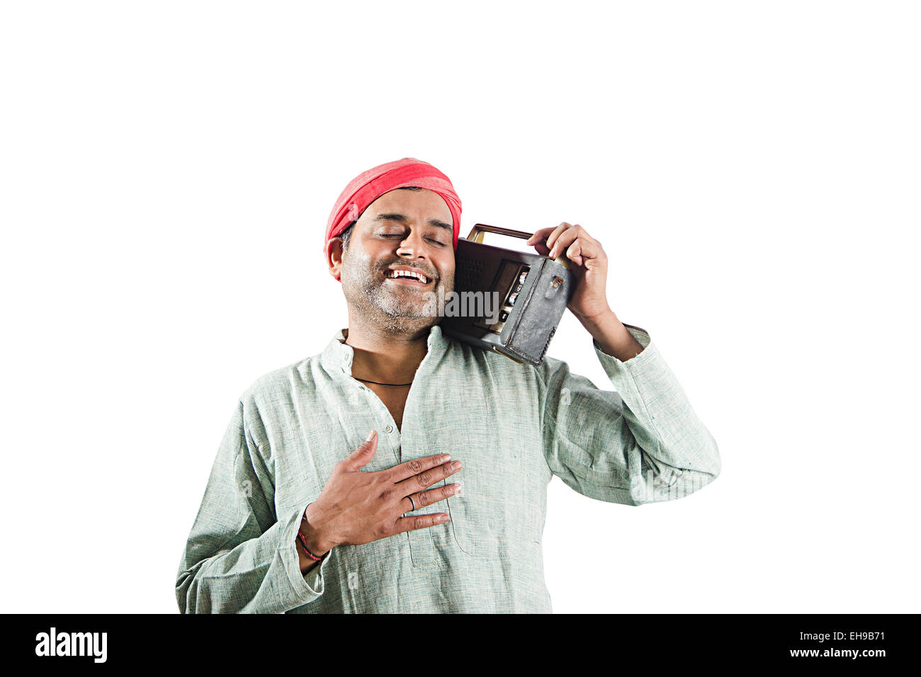 1 indian rural man hearing FM Radio Stock Photo - Alamy