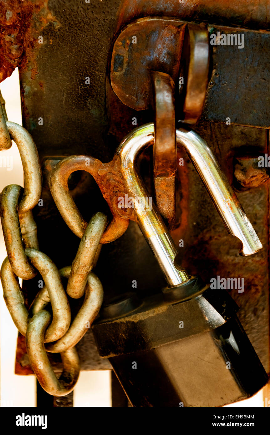 Unlocked gate that in rusty and old Stock Photo - Alamy
