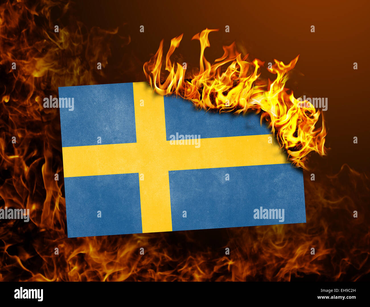 Flag burning - concept of war or crisis - Sweden Stock Photo - Alamy