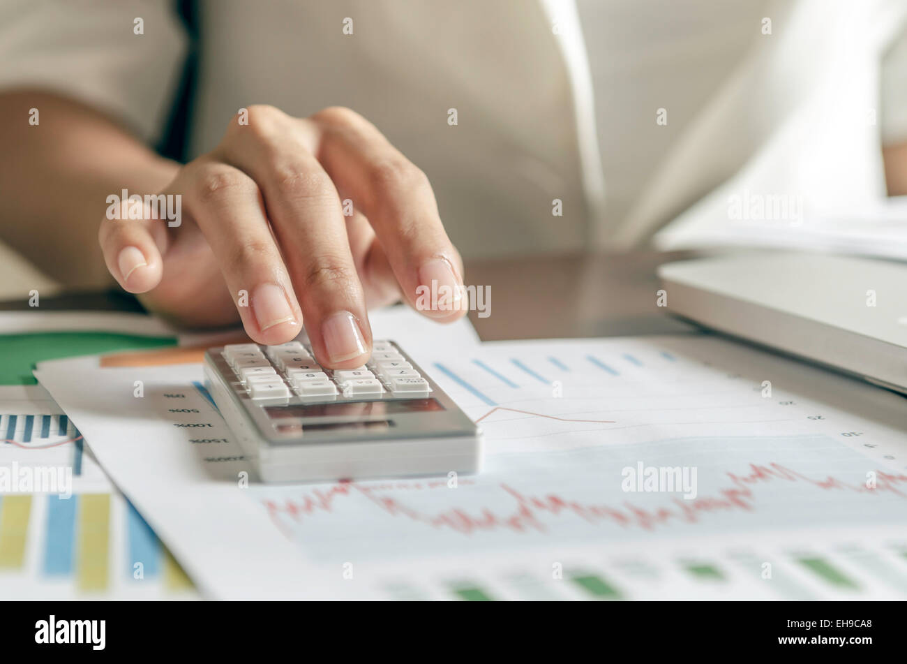 Working with calculator Stock Photo - Alamy