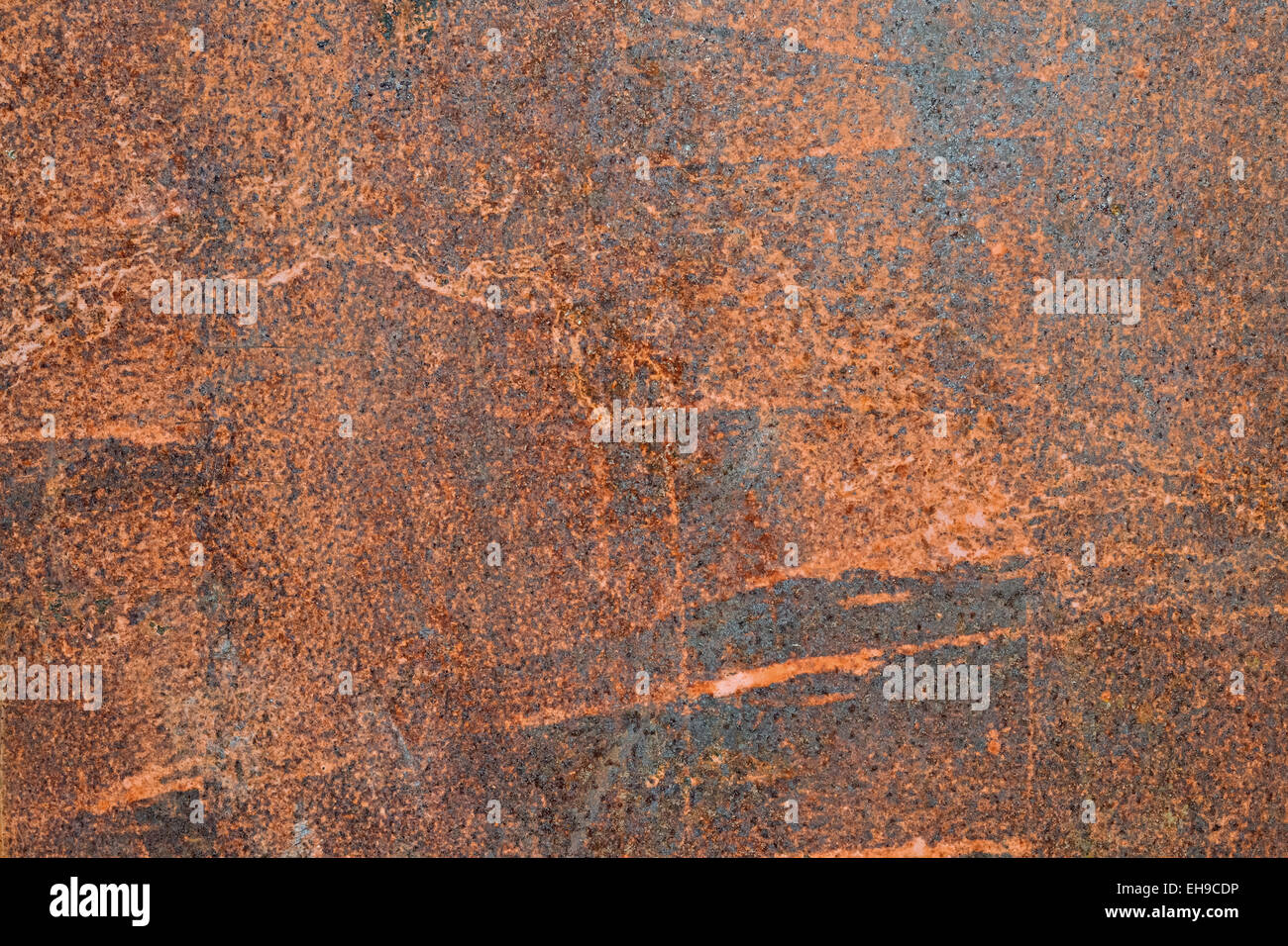 Closeup of rusty metal panel as background with detailed structure ...
