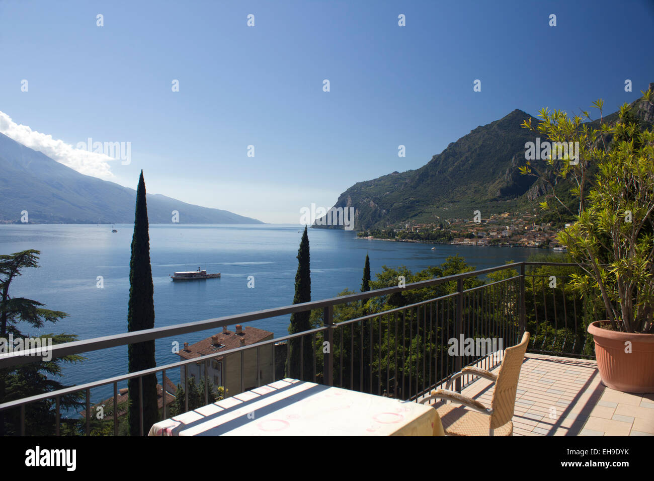 Terrace overlooking a lake. View from a terrace across Lake Garda with ...