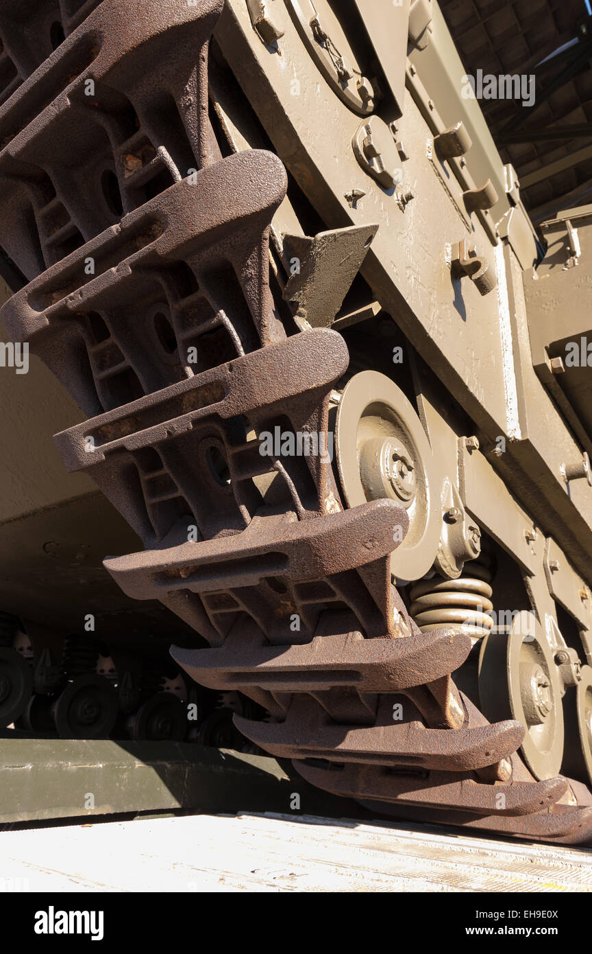 iron caterpillar racks of army tanks that have seen battle waiting to ...