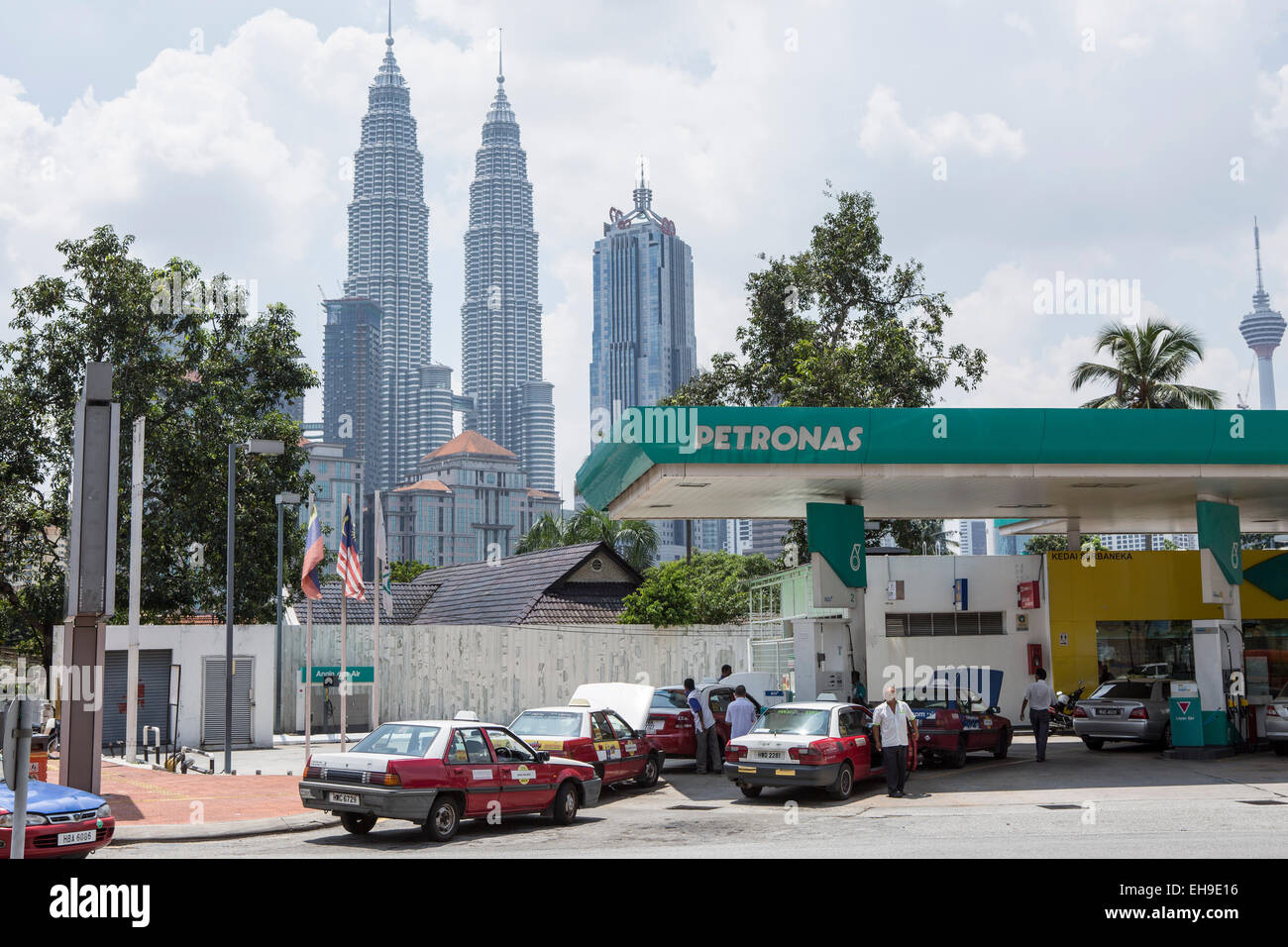Taxis line up to fill up at a Pertoliam Nasional Bhd. (Petronas) gas ...