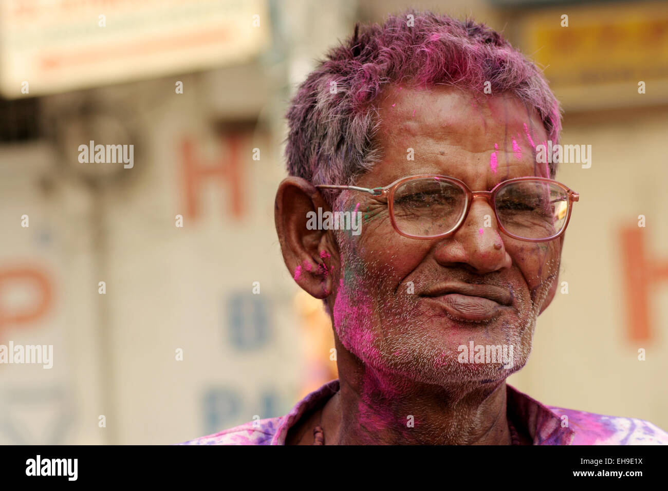Hindu old man celebrate Holi,festival of colors,annual festival on ...