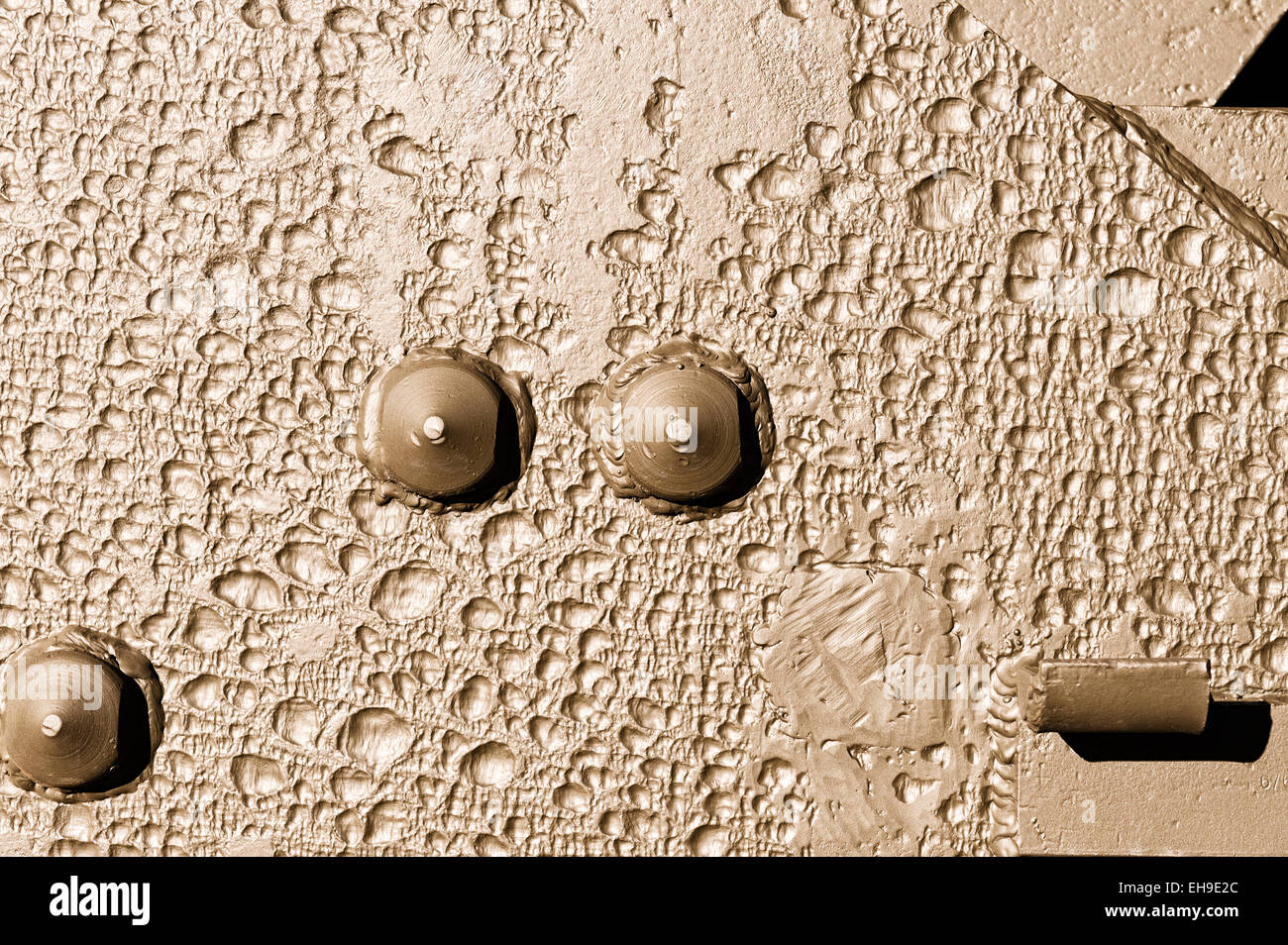 surface details of heavy tank amour plated steel painted dessert sand ...