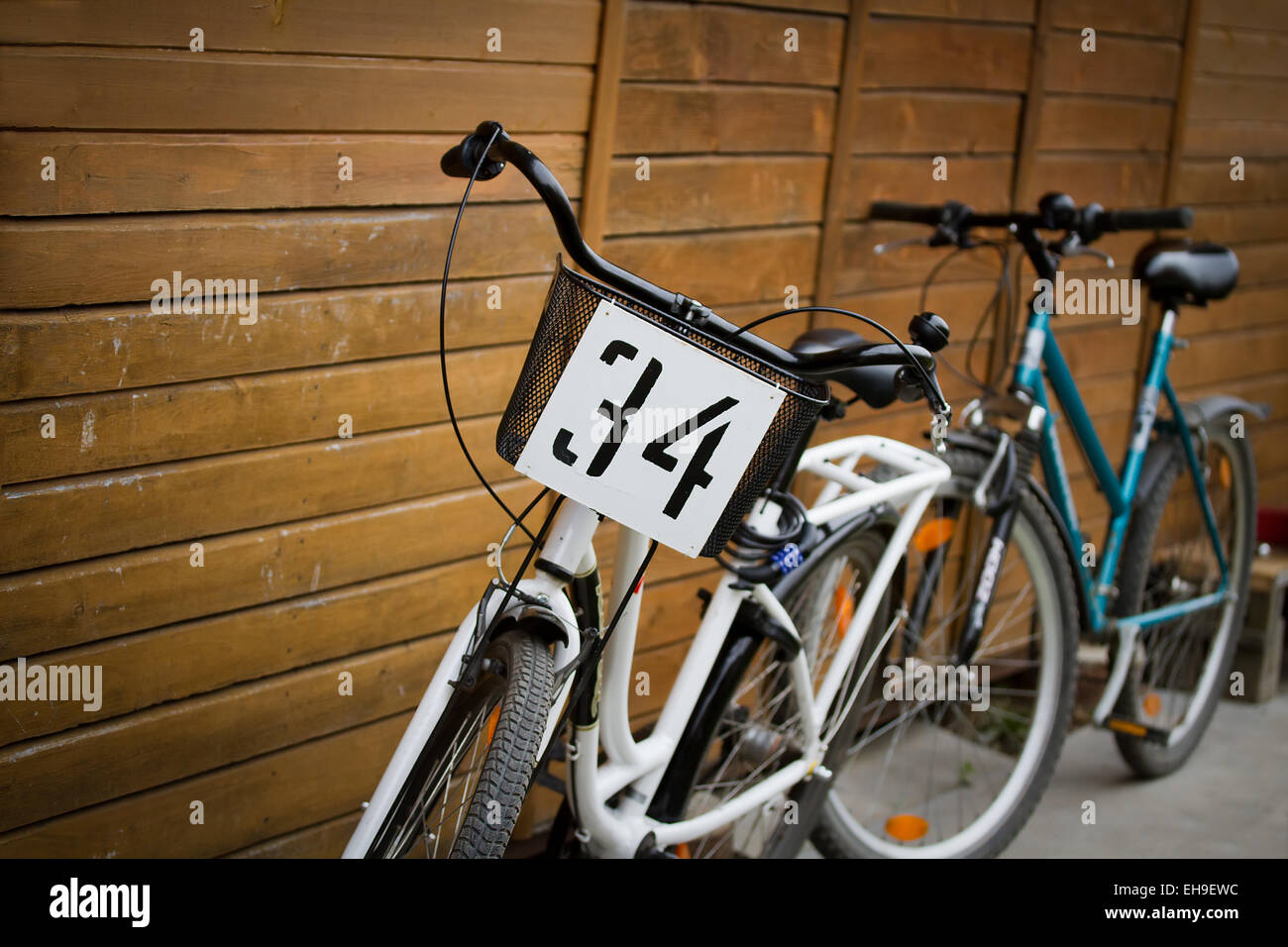 Two bicycles near the wall Stock Photo - Alamy