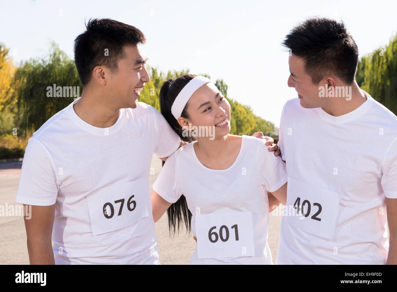 Marathon runners meet up Stock Photo - Alamy