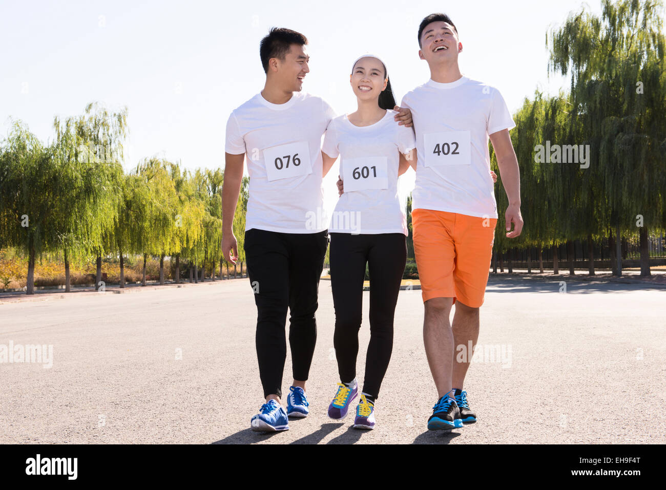Marathon runners meet up Stock Photo - Alamy