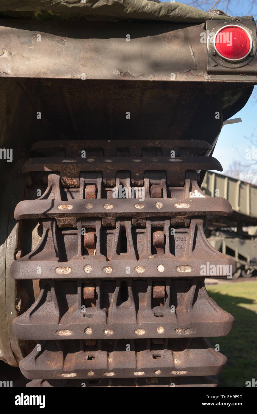 iron caterpillar racks of army tanks that have seen battle waiting to ...