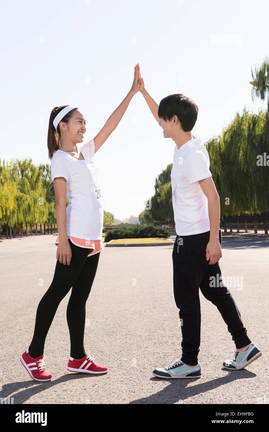 Marathon runners meet up Stock Photo - Alamy
