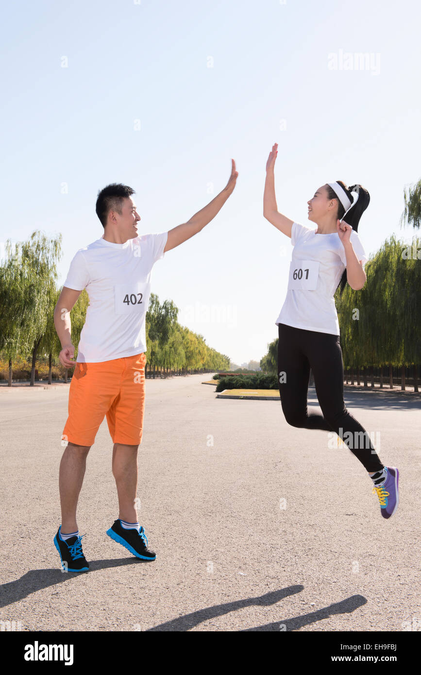 Marathon runners meet up Stock Photo - Alamy