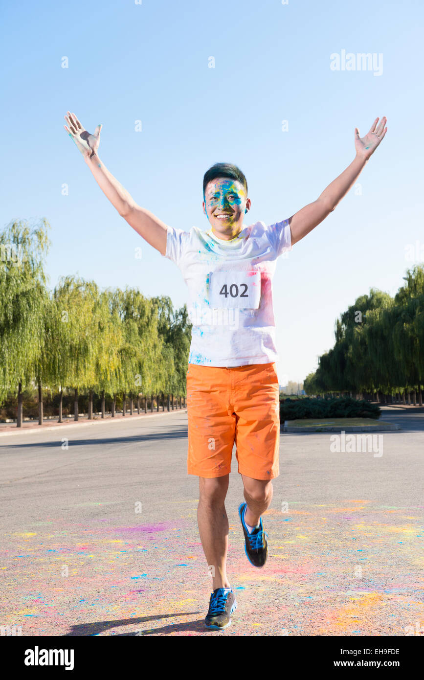 Run arms raised man hi-res stock photography and images - Alamy