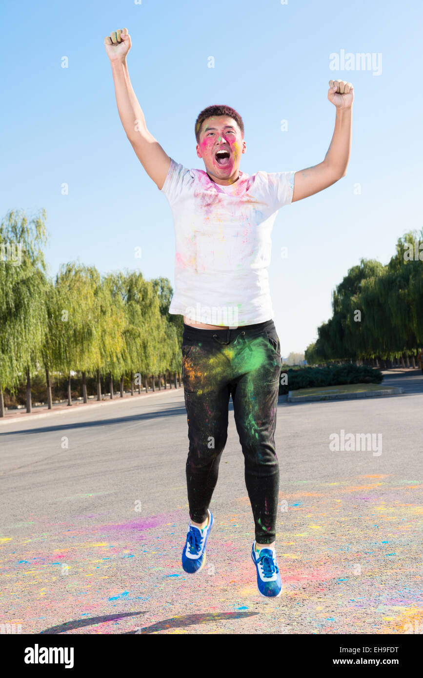 Young man at The Color Run Stock Photo - Alamy