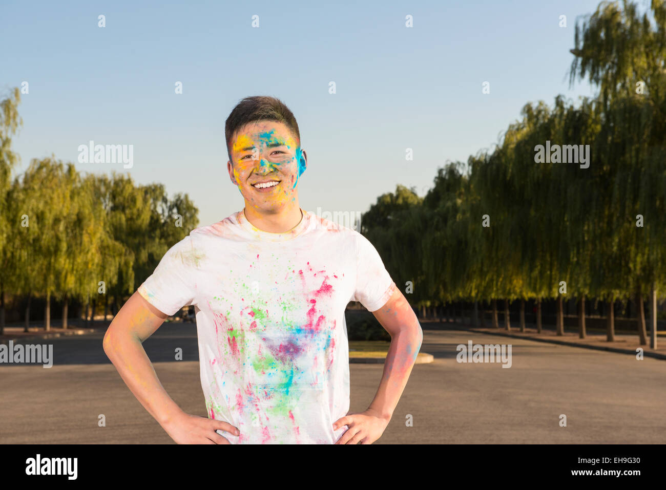 Young man at The Color Run Stock Photo - Alamy
