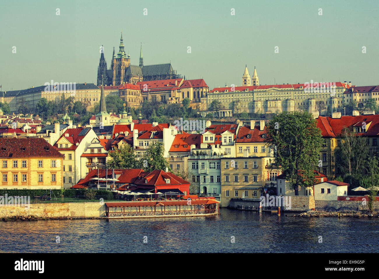 Panorama of Prague in the early spring morning sun on the river Vltava ...