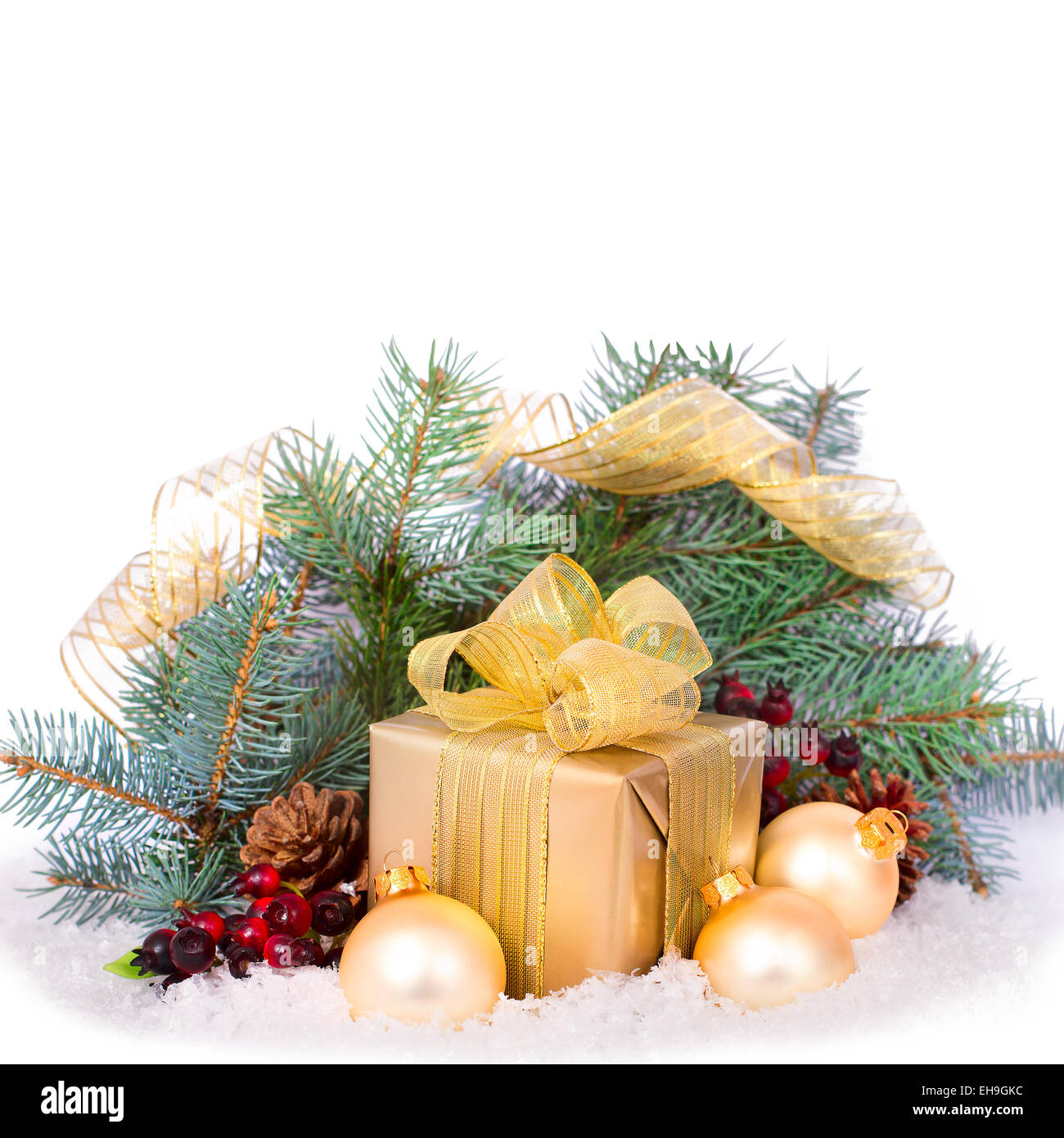 Gold gift box with ribbon and bow isolated Stock Photo - Alamy