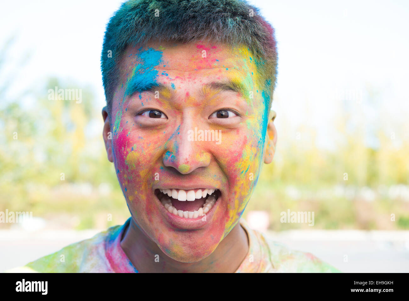 Young man at The Color Run Stock Photo - Alamy