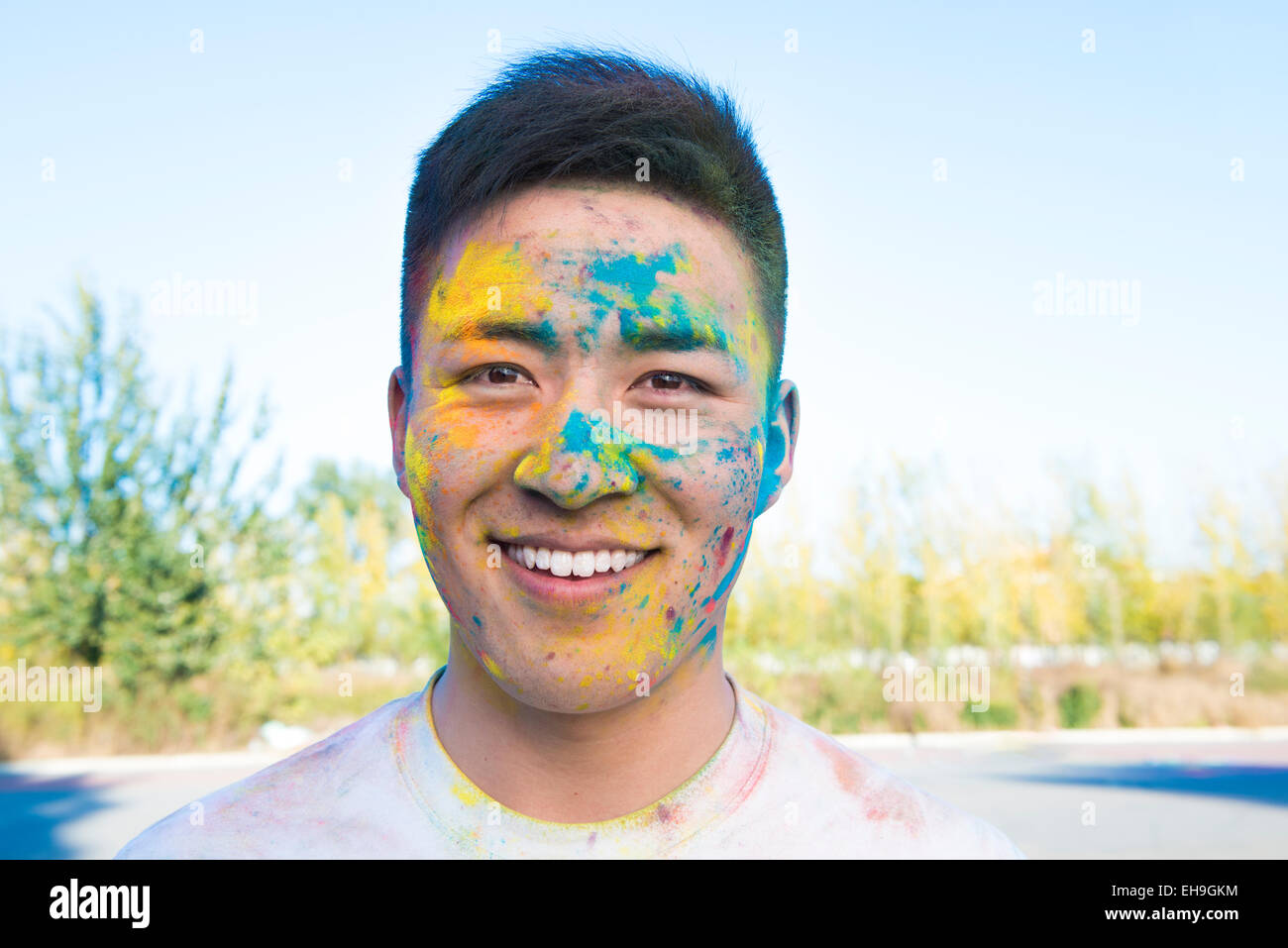 Young man at The Color Run Stock Photo - Alamy