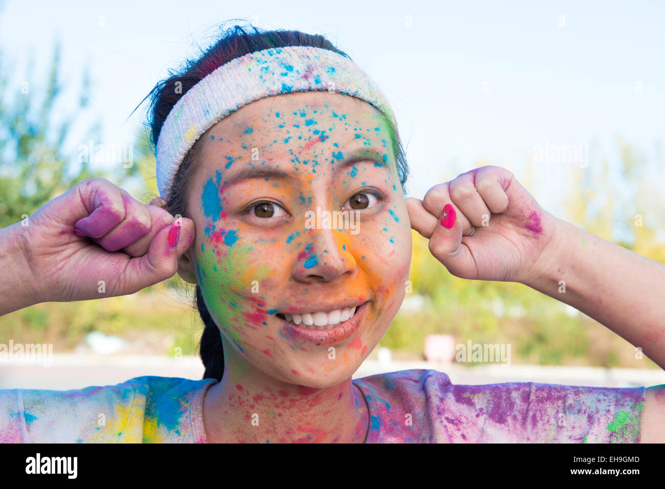 Young woman at The Color Run Stock Photo - Alamy
