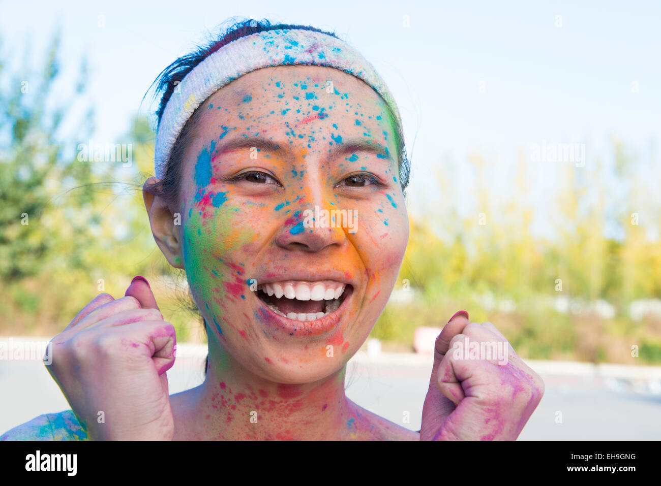 Young woman at The Color Run Stock Photo - Alamy
