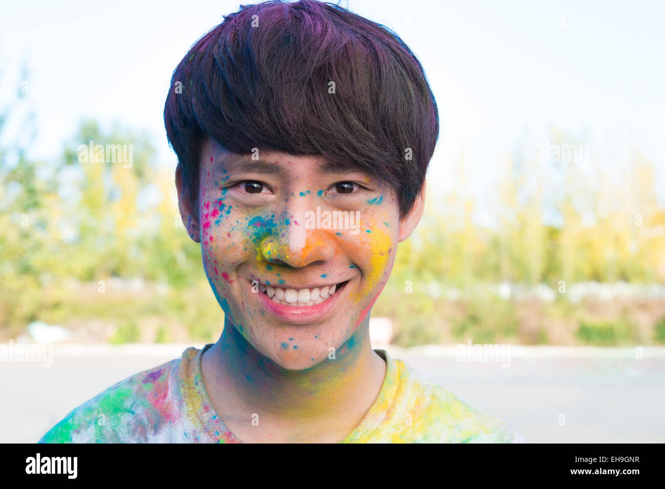 Young man at The Color Run Stock Photo - Alamy