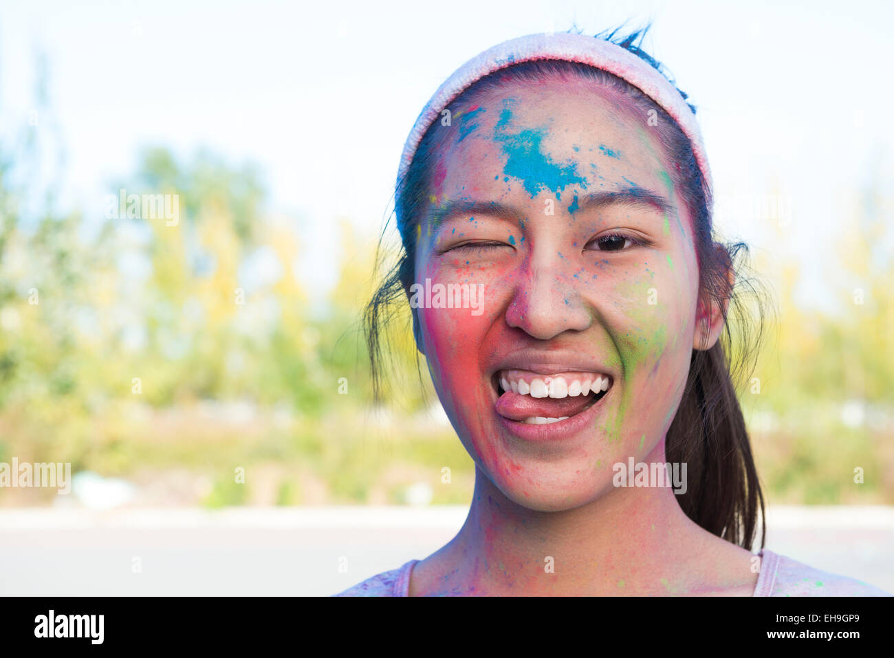 Young woman at The Color Run Stock Photo - Alamy