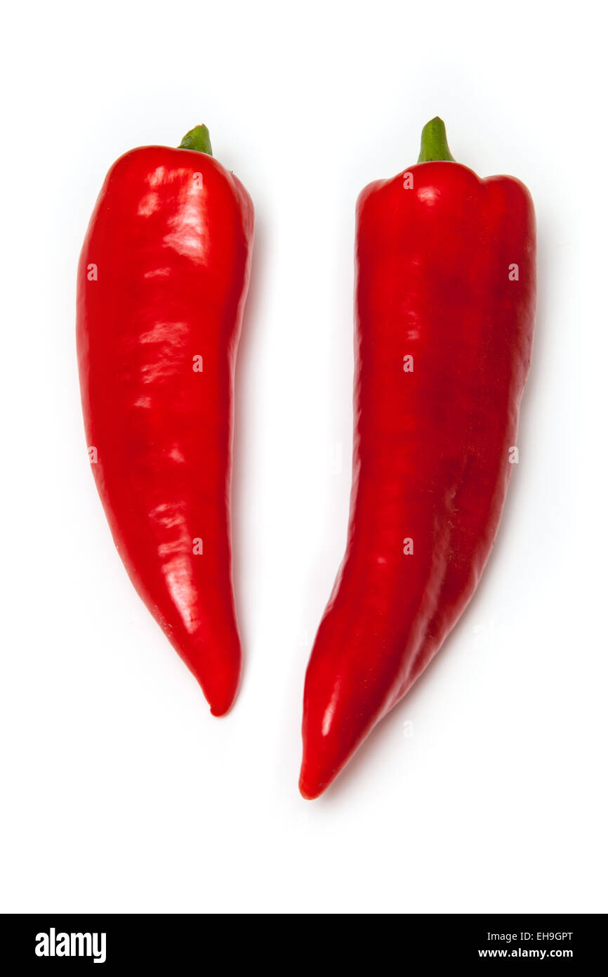 Pointed red peppers isolated on a white studio background Stock Photo ...