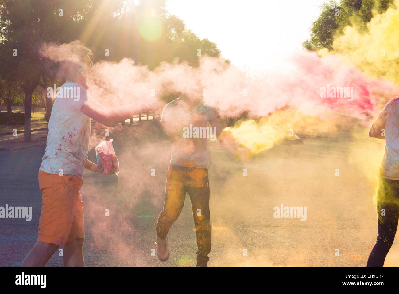 People throwing powder at The Color Run Stock Photo - Alamy