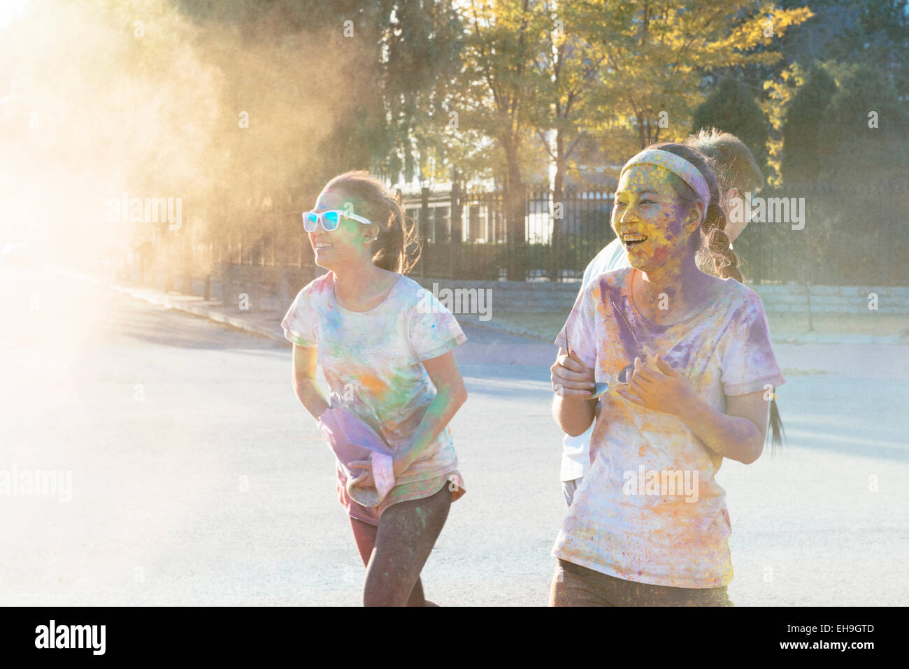 People throwing powder at The Color Run Stock Photo - Alamy