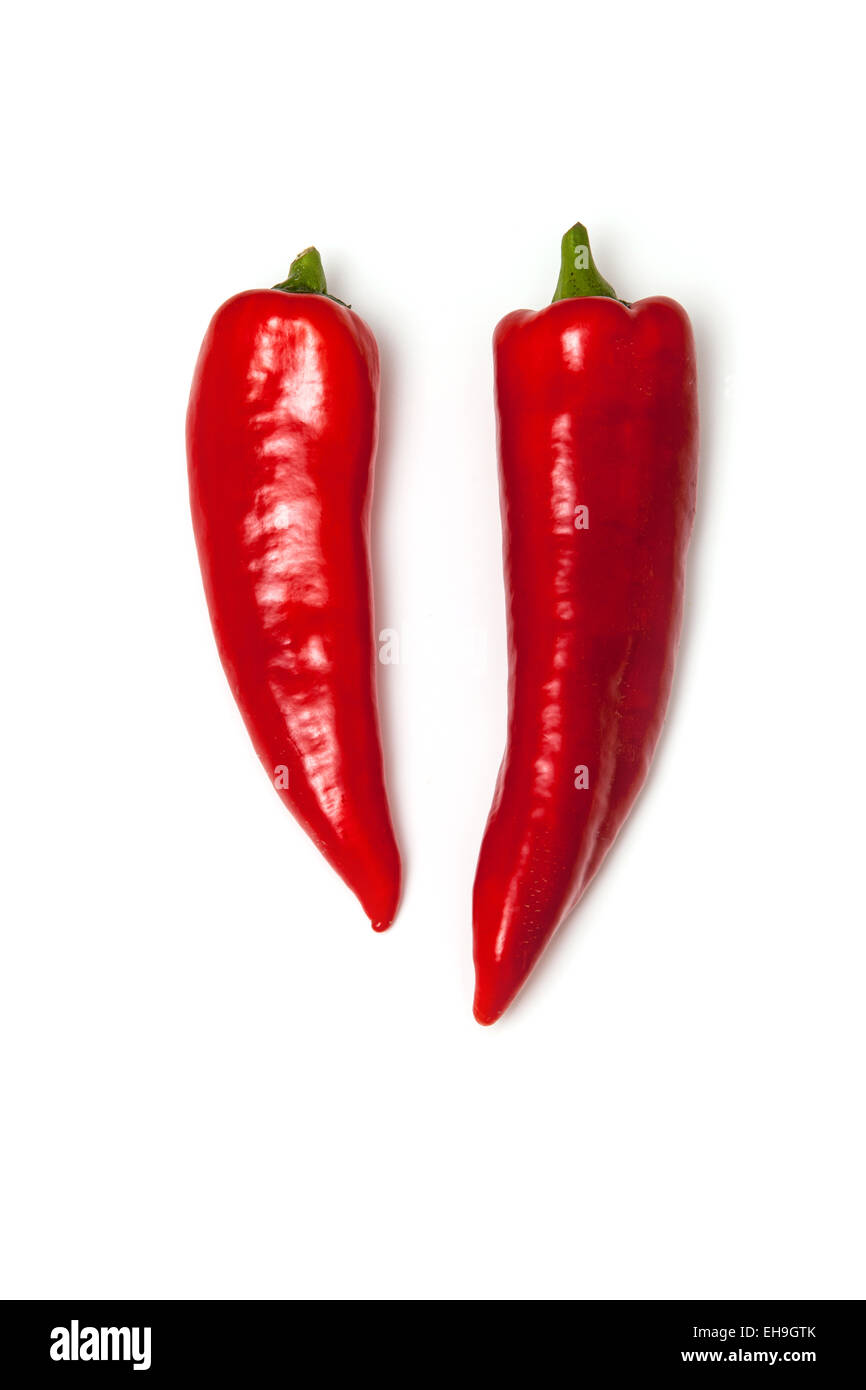 Pointed red peppers isolated on a white studio background Stock Photo ...