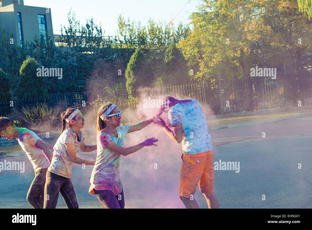People throwing powder at The Color Run Stock Photo - Alamy