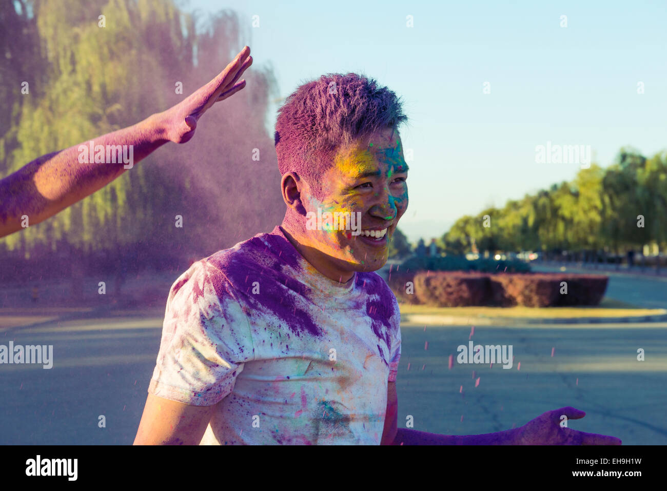 Young man at The Color Run Stock Photo - Alamy