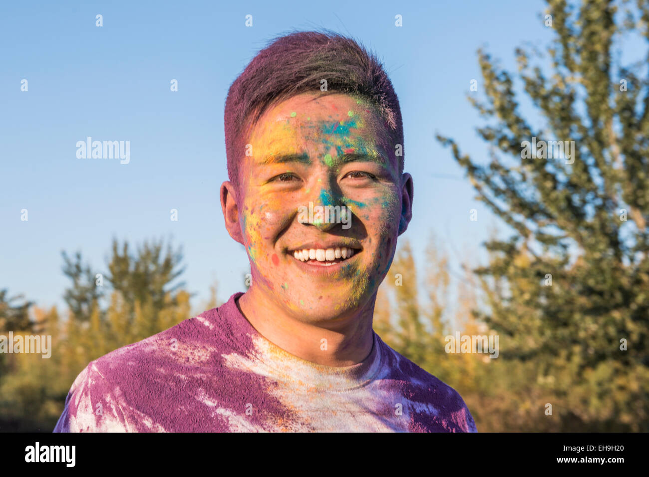Young man at The Color Run Stock Photo - Alamy