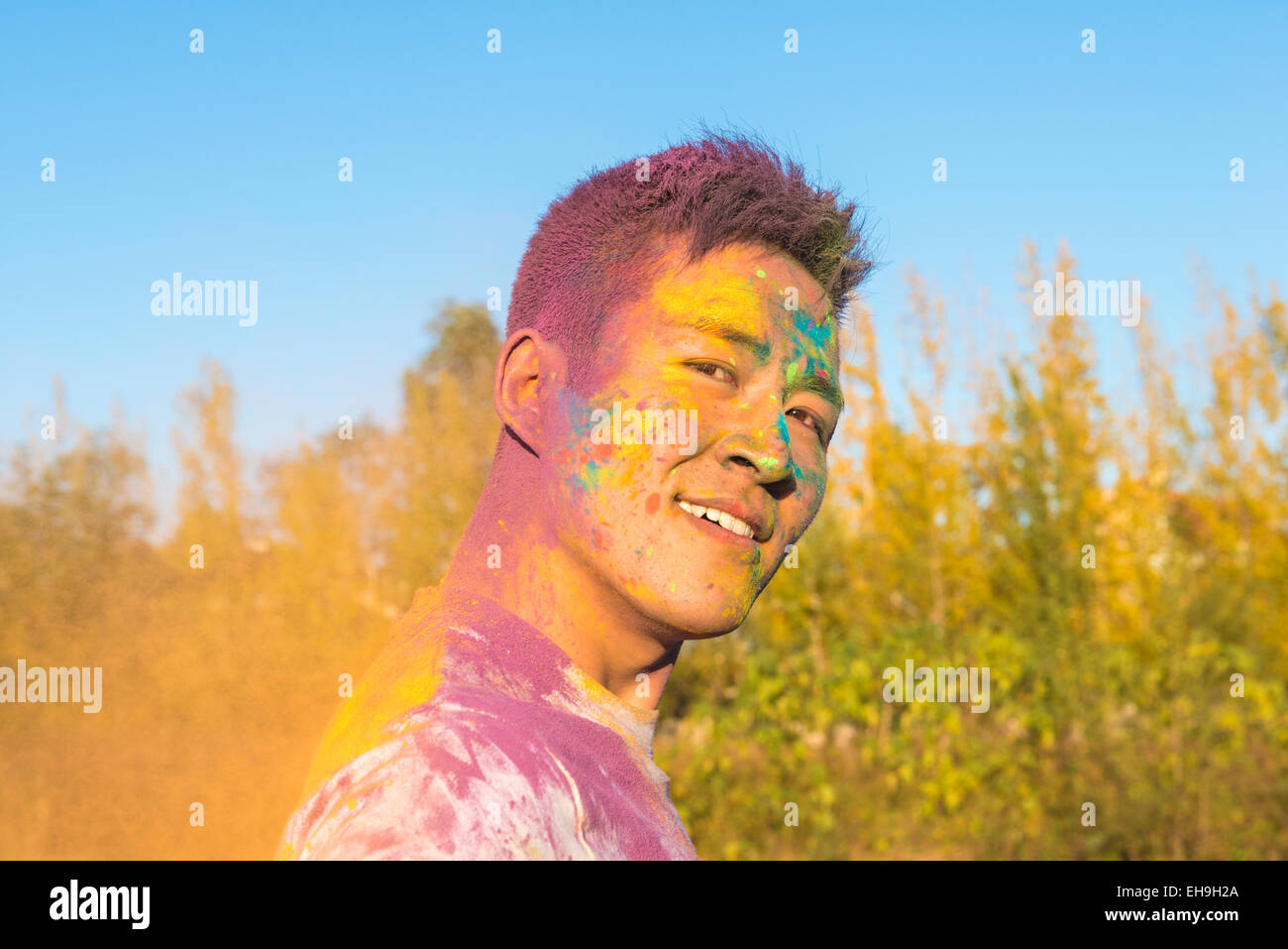 Young man at The Color Run Stock Photo - Alamy