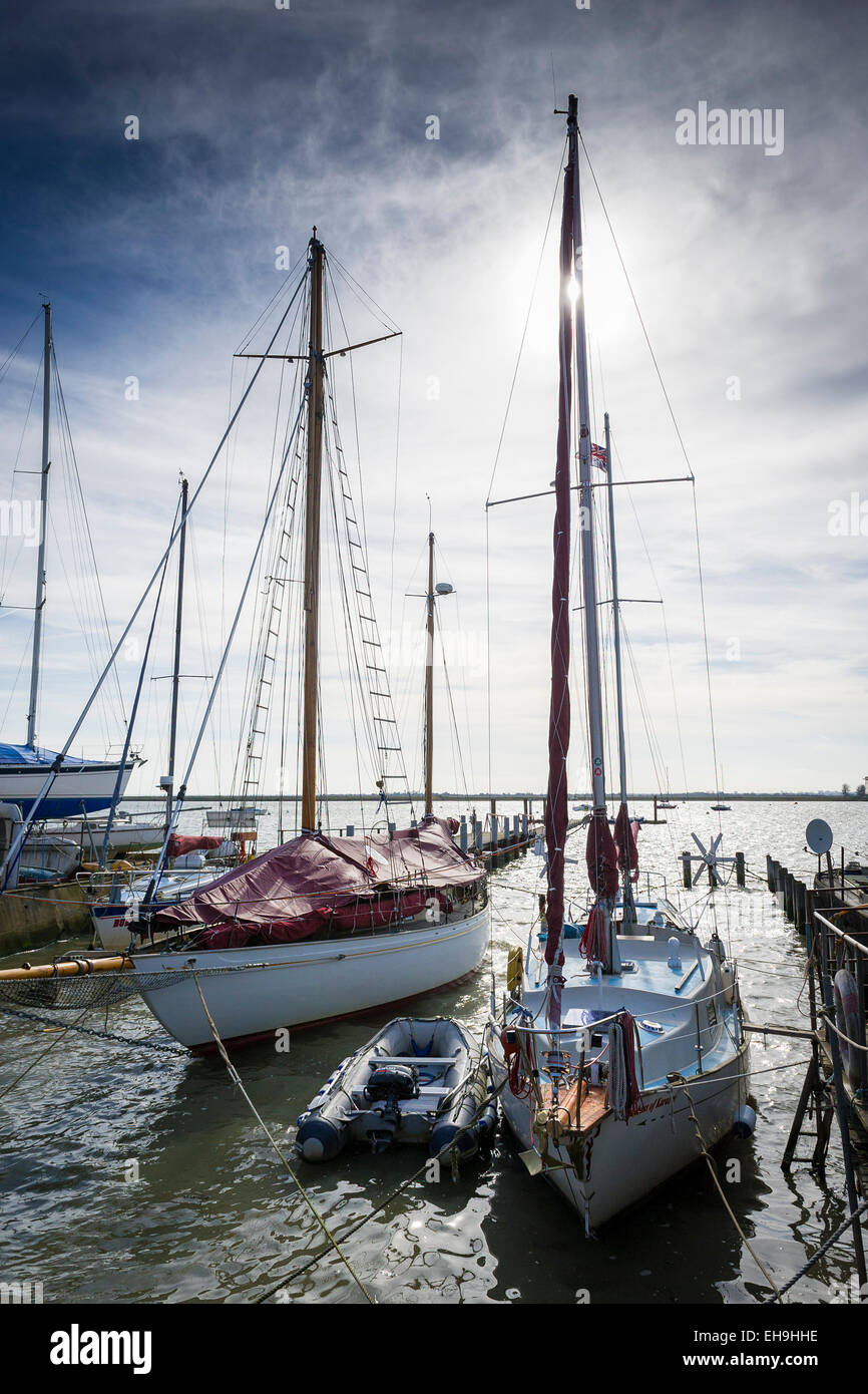 Sailboats moored on of the River Crouch at Burnham on Crouch in Essex ...