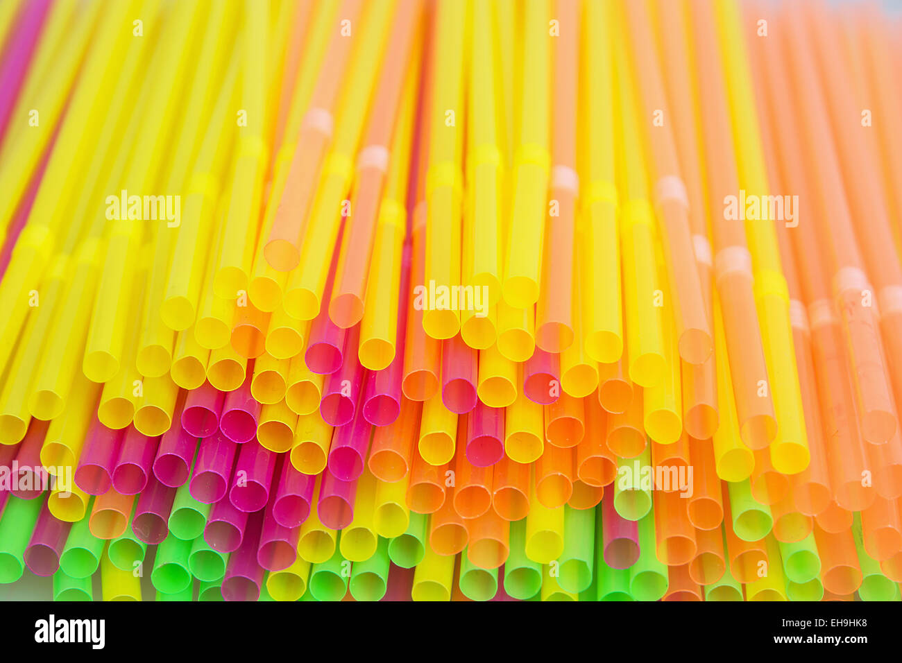 Background of plastic colored drinking straws Stock Photo - Alamy