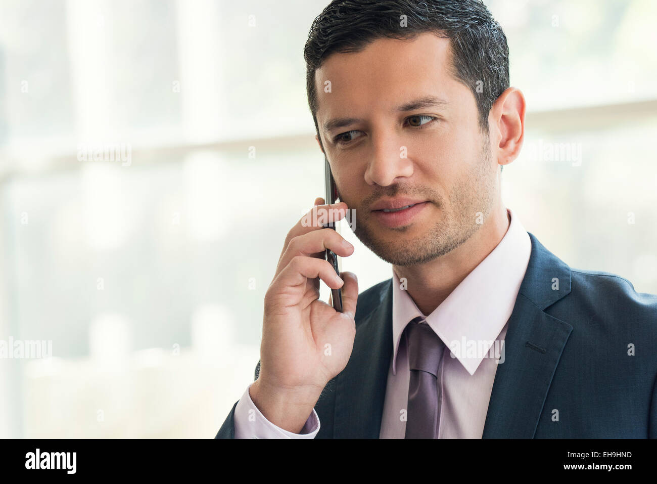 Businessman using cell phone Stock Photo - Alamy