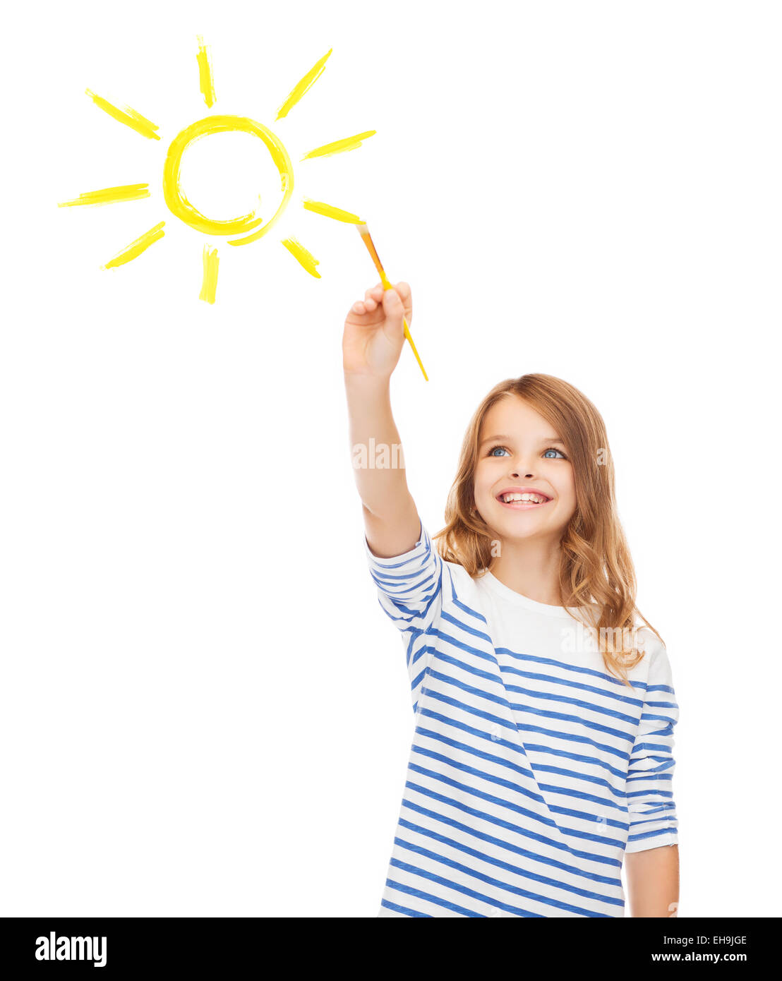 cute little girl drawing sun with brush Stock Photo - Alamy