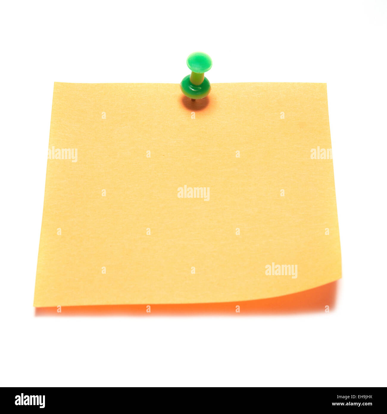 Orange note with tack isolated on white Stock Photo - Alamy