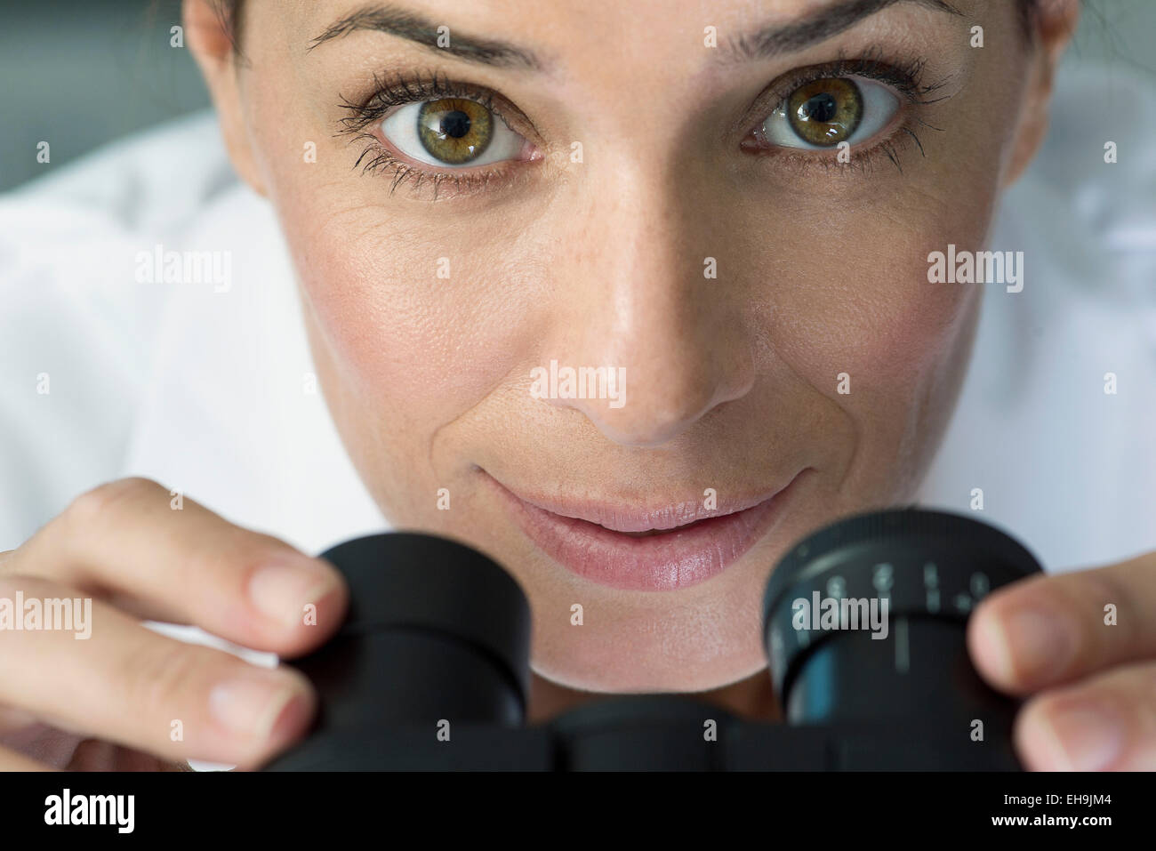 Scientist using microscope, portrait Stock Photo - Alamy