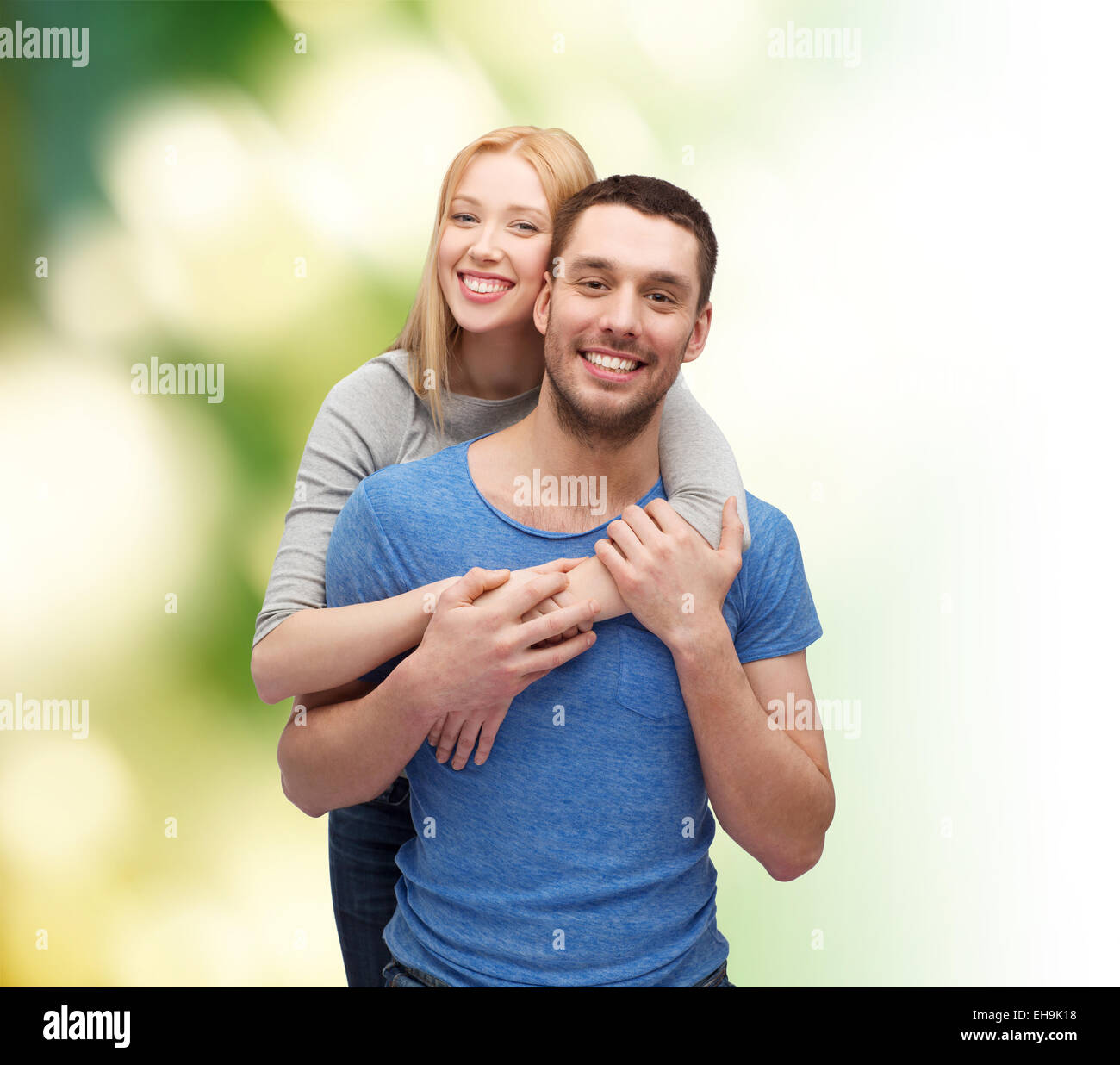 smiling couple hugging Stock Photo - Alamy