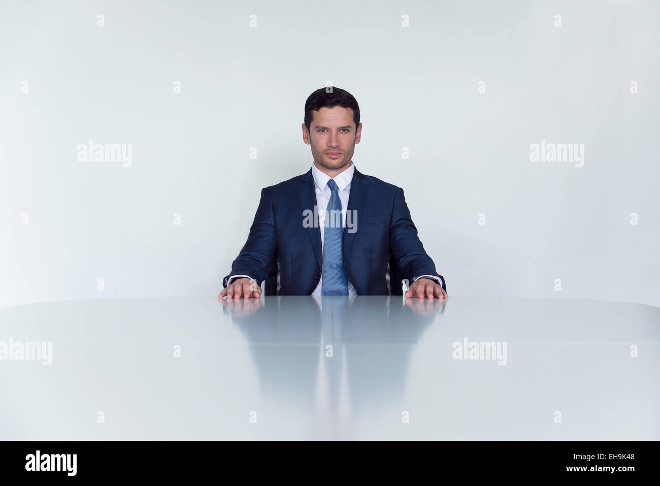 Seated at conference table hi-res stock photography and images - Alamy