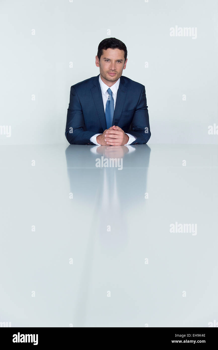 Seated at conference table hi-res stock photography and images - Alamy