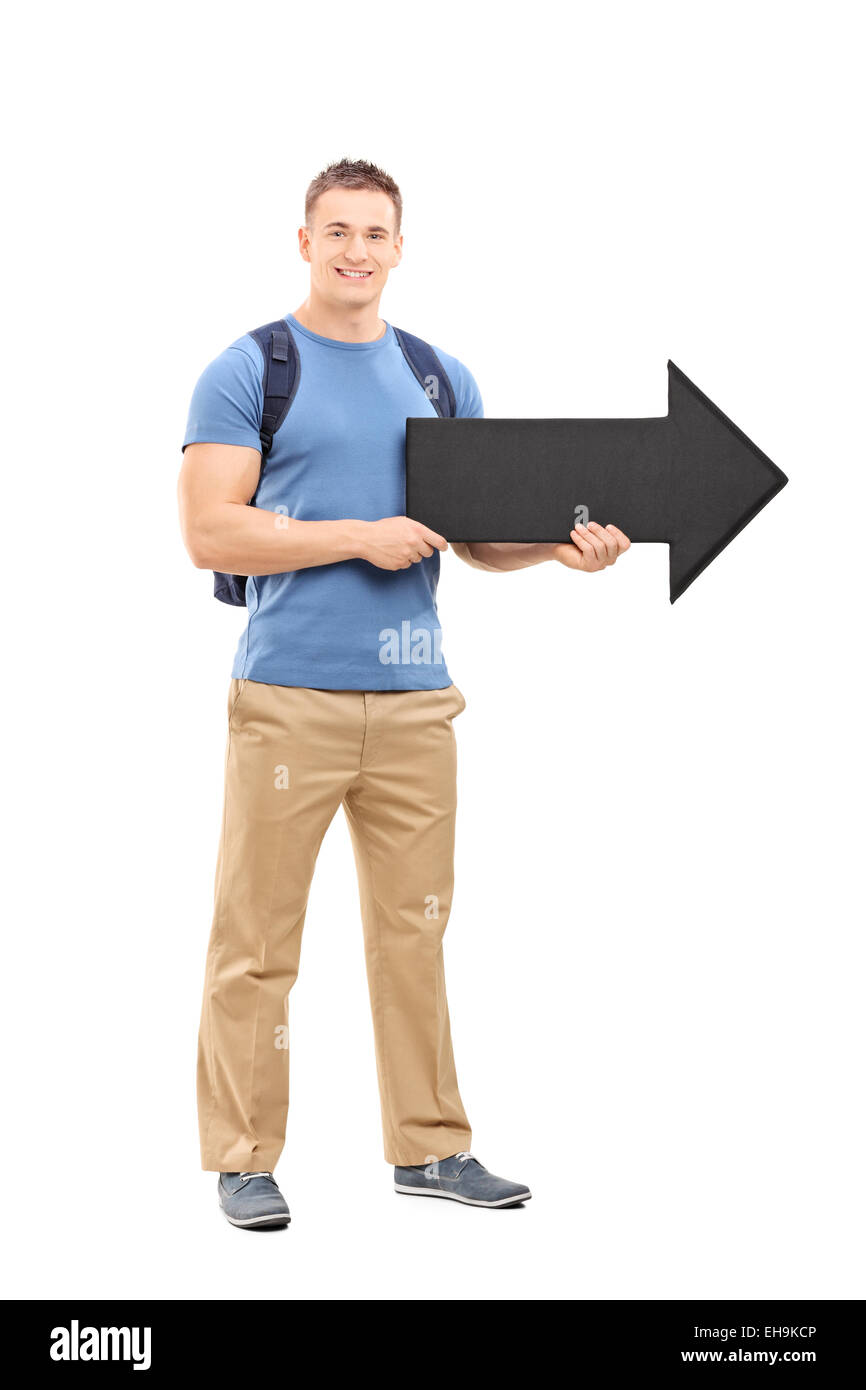Happy black guy holding arrow hi-res stock photography and images - Alamy
