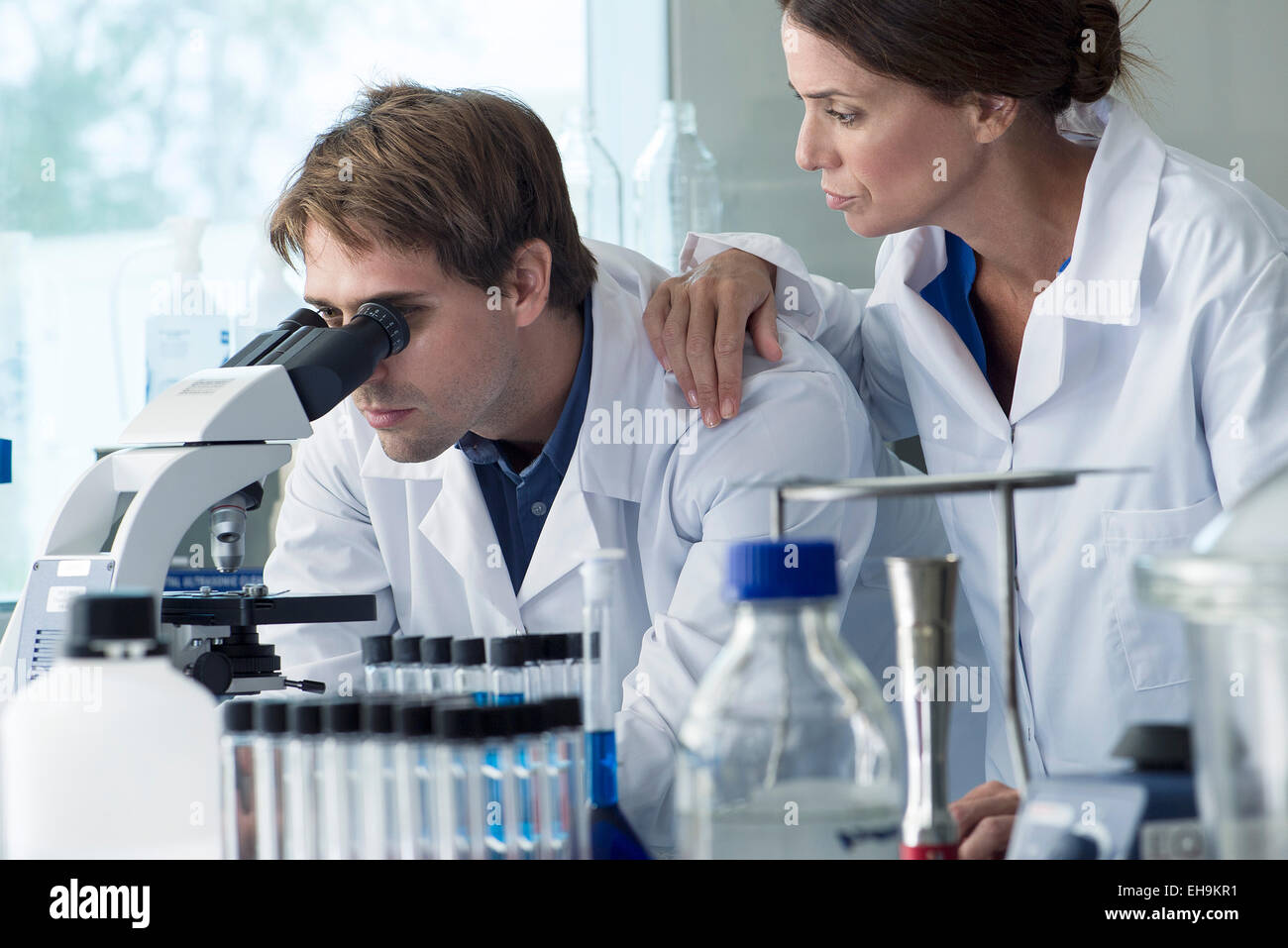 Scientists working in laboratory Stock Photo - Alamy