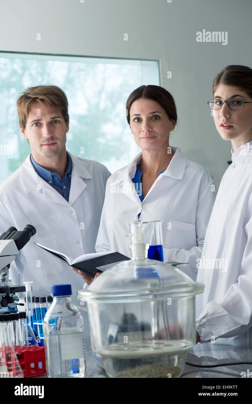 Woman working flasks in laboratory hi-res stock photography and images ...