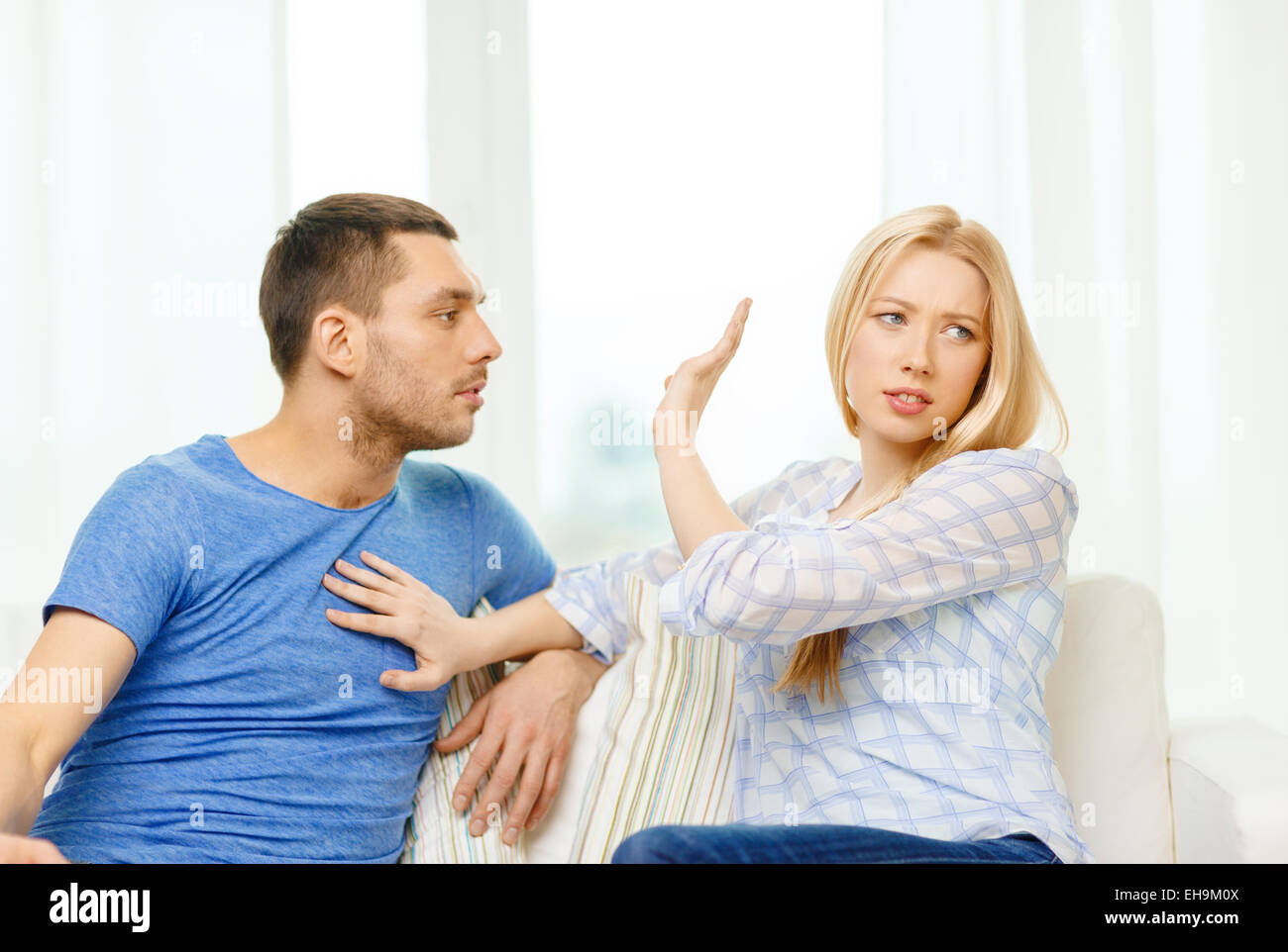 unhappy couple having argument at home Stock Photo - Alamy
