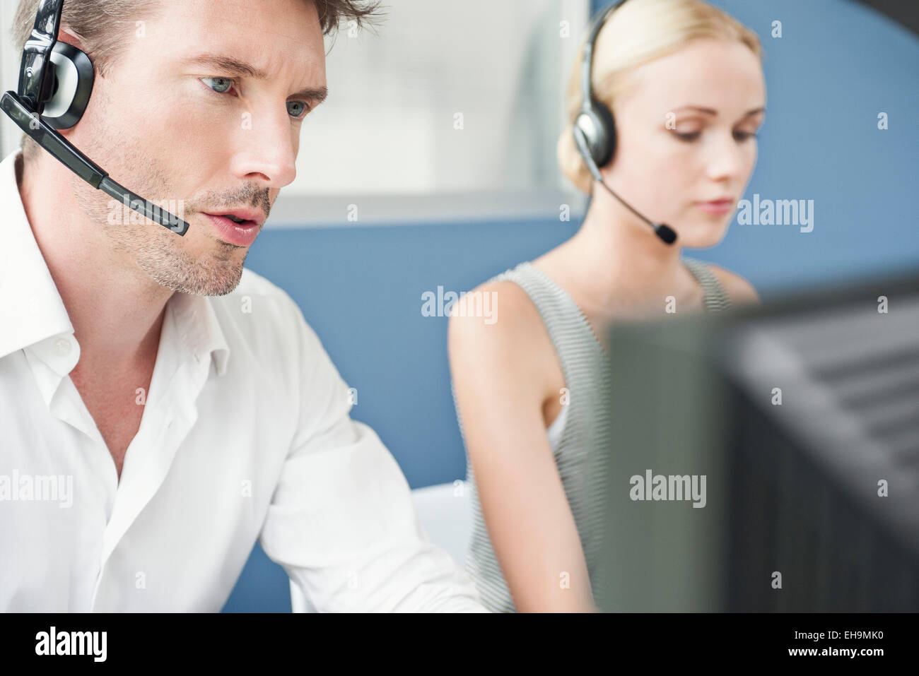 Working in call center Stock Photo - Alamy