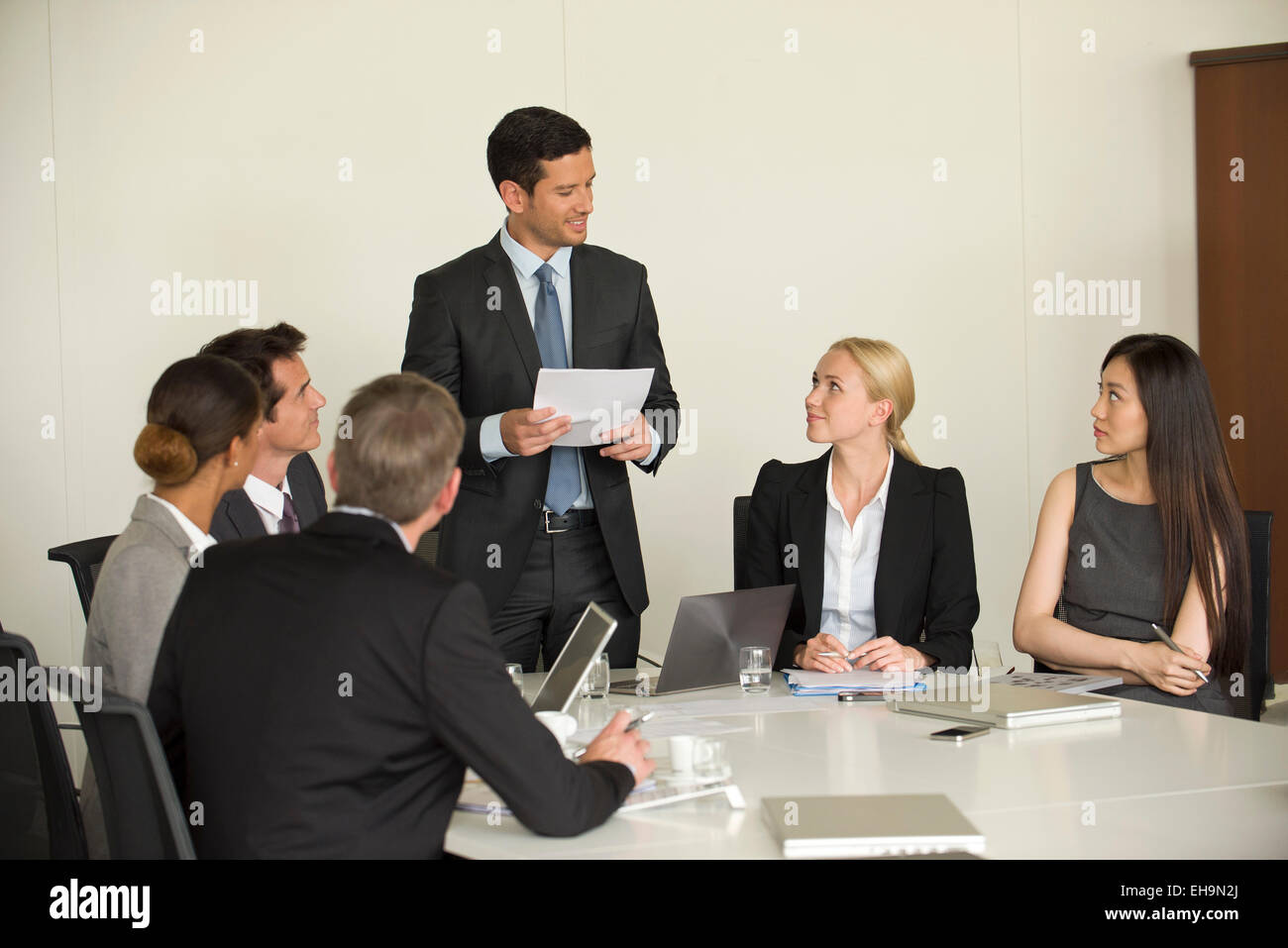 Executive giving presentation in meeting Stock Photo - Alamy